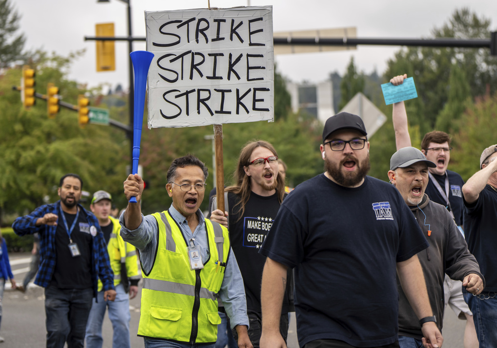 Boeing factory workers vote whether to strike and shut down aircraft ...